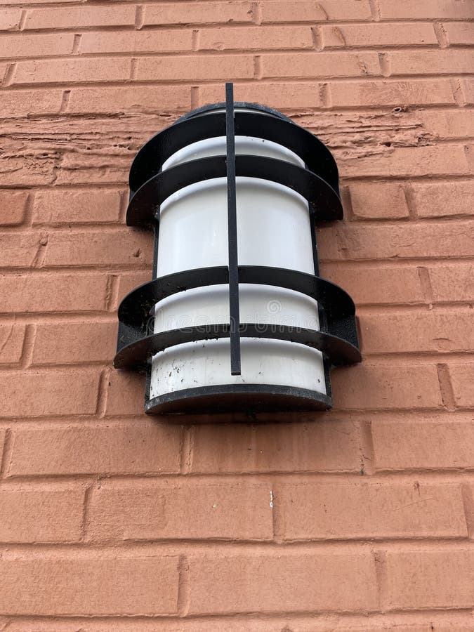 A Vintage Exterior Wall Light on a Brick Wall Looking Up Stock Image ...