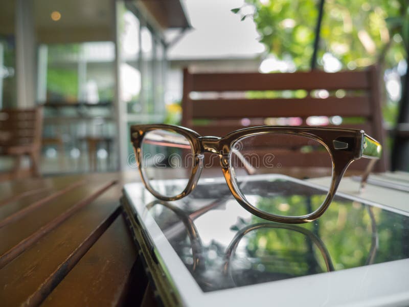 Vintage Eyeglasses on the Tablet Computer Stock Photo - Image of ...