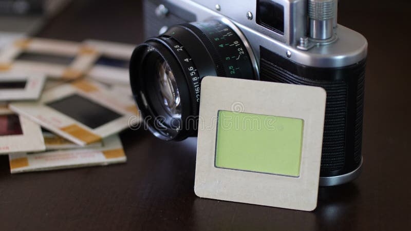 Vintage Film Camera and Slide Film Stock Photo - Image of location ...