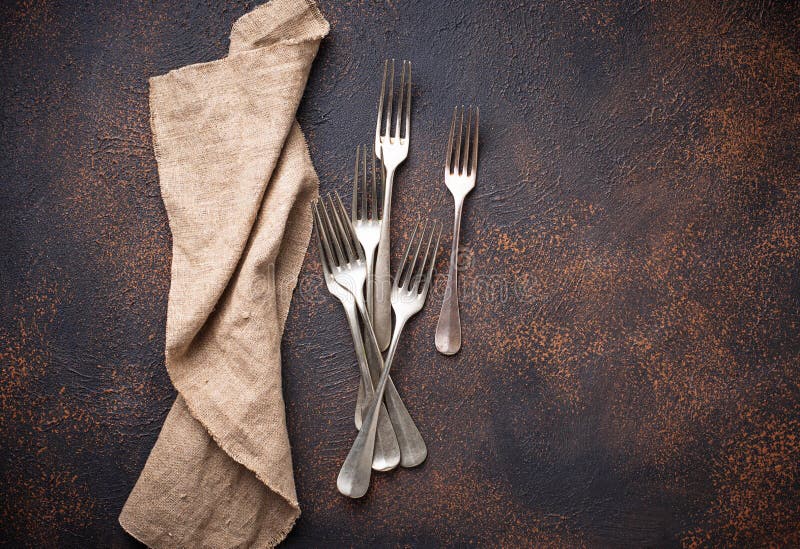 Vintage Forks on Rusty Background Stock Image - Image of concrete ...