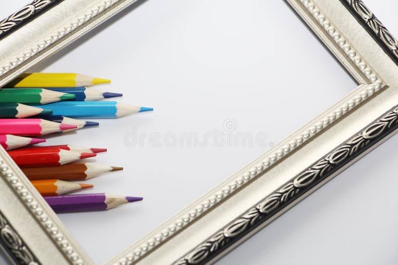 Vintage Frame for Paintings and Colored Pencils on a White Background ...