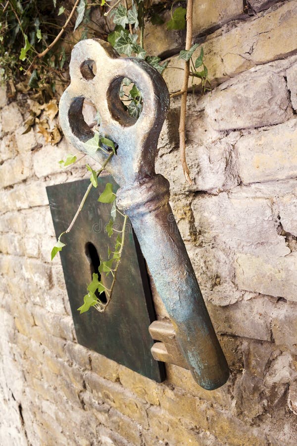 Vintage Giant Key and Keyhole Stock Photo - Image of close, home: 79037522