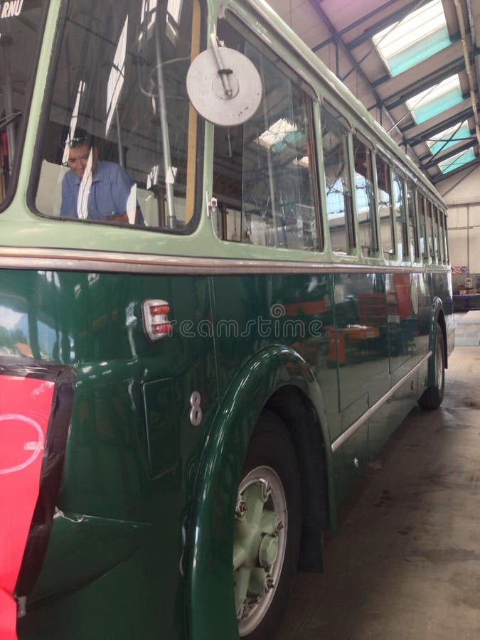 Vintage Green Bus in the Garage Editorial Photo - Image of passenger ...