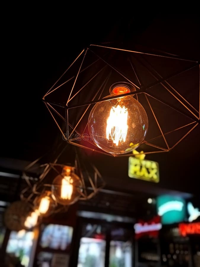 Vintage Halogen Bulb Glowing in the Bar Stock Photo - Image of india ...