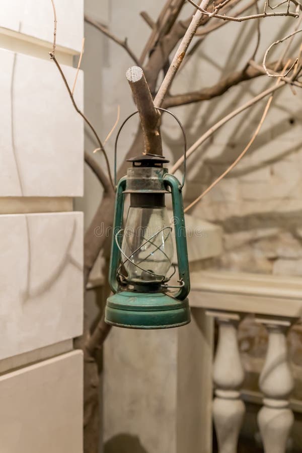 Vintage Hand Lamp Hanging on Tree Stock Photo - Image of ancient, glass ...