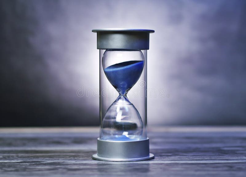 Vintage Hour Glass with Blue Sand Stock Photo - Image of download ...