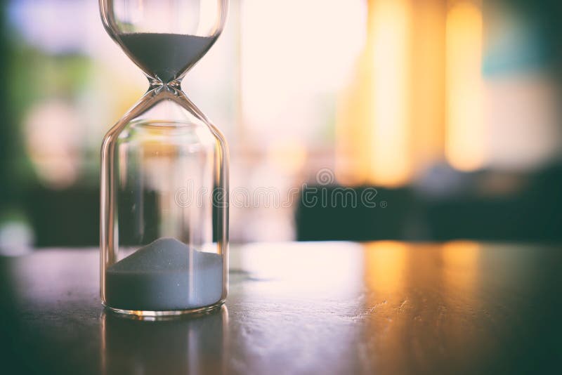 Vintage Hourglass Clock Over Table Stock Image - Image of timer, modern ...