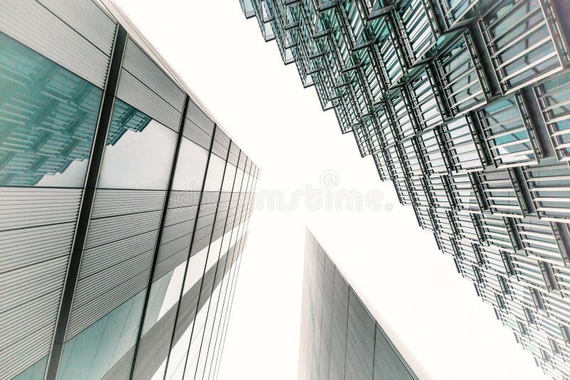 A Photo Looking Up Capturing Three Different Buildings on an Angle ...