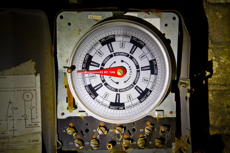 Vintage Industrial Timer in Dimly Lit Setting, East St. Louis Stock ...
