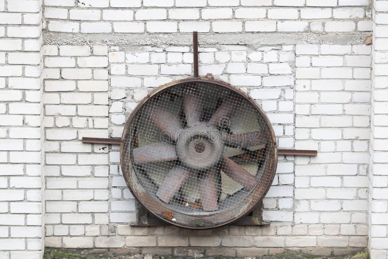 Vintage Industrial Ventilation Fan Against White Brick Wall Stock Image ...