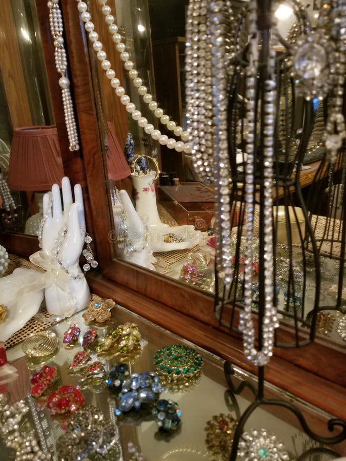 Vintage jewelry on display stock photo. Image of mirror - 116369708