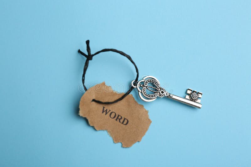 Vintage Key with Tag on Light Blue Background, Top View. Keyword ...