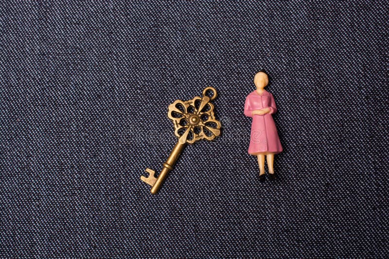Vintage Key and a Toy Figure on the Fabric Stock Photo - Image of ...