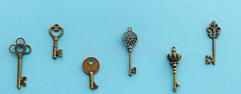 Vintage Keys on a Blue Paper Background. Stock Image - Image of ...