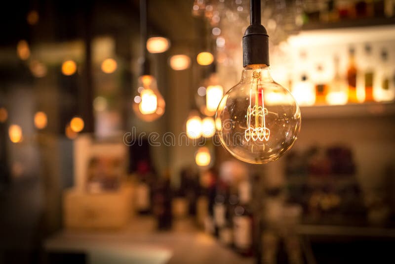 Vintage Lamp Bulb with Bar or Cafe Night Abstract Background Stock ...