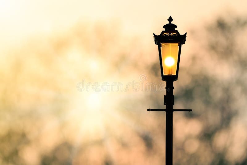Vintage Lamp Post with Sunset Background Stock Photo - Image of ...