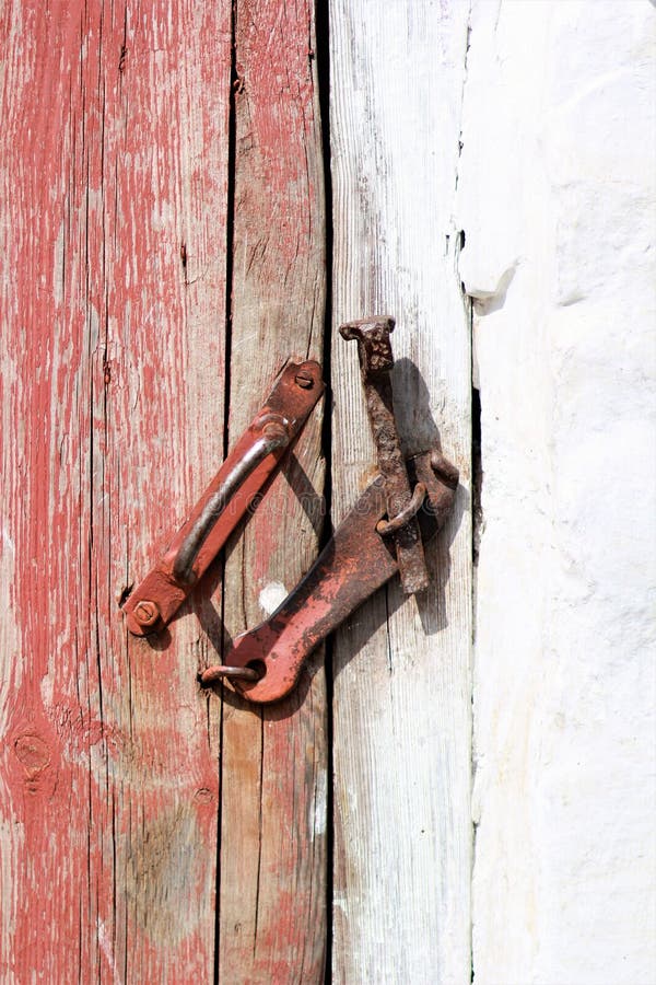 Vintage latch on red door stock image. Image of handle - 91408313