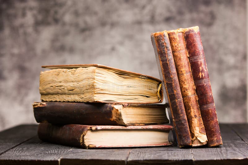 Vintage Leather Books Stack on Old Rustic Wooden Surface Stock Photo ...