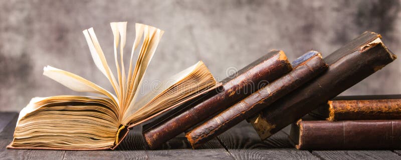 Vintage Leather Books Stack on Old Rustic Wooden Surface Stock Image ...