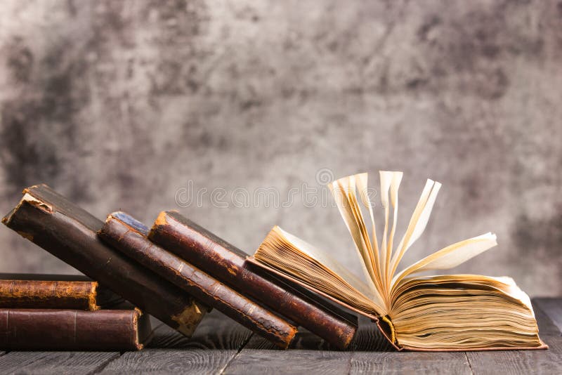 Vintage Leather Books Stack on Old Rustic Wooden Surface Stock Photo ...