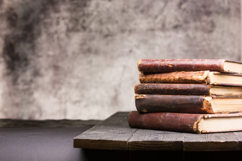 Vintage Leather Books Stack on Old Rustic Wooden Surface Stock Photo ...