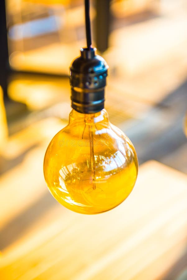 Vintage light bulb in shop stock image. Image of brown - 247751181