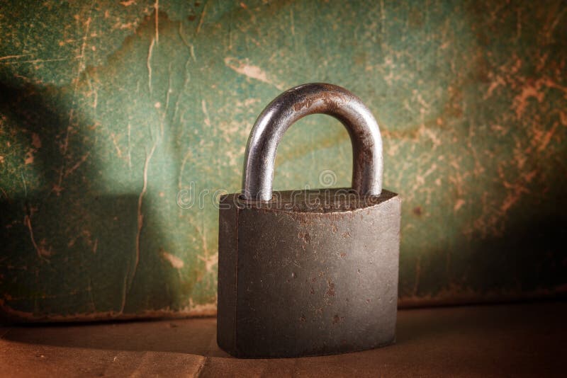 Vintage lock on old table. stock photo. Image of private - 133051308