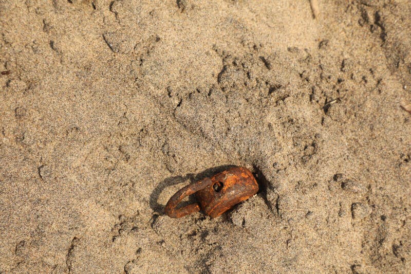 Vintage Lock in a Sand stock photo. Image of emblem - 331588118