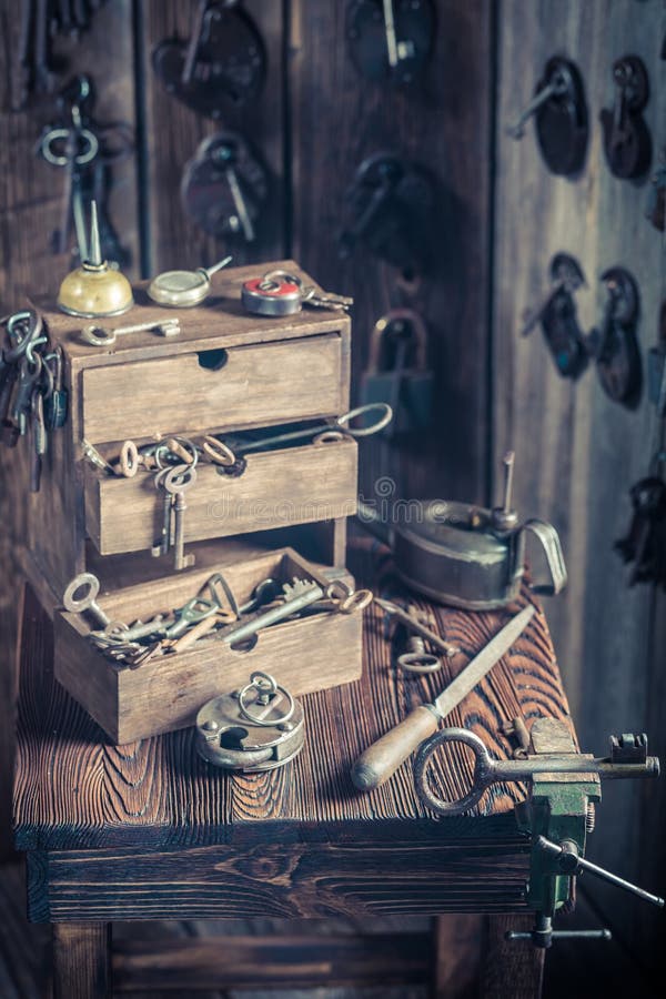 Vintage Locksmiths Workshop with Tools, Locks and Keys Stock Photo ...