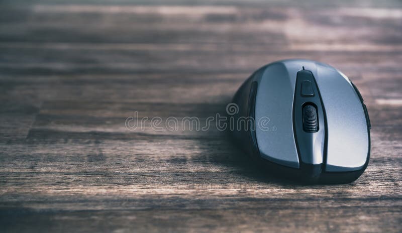 Vintage Look of a Computer Mouse on Dark Wooden Table, Front View Stock ...