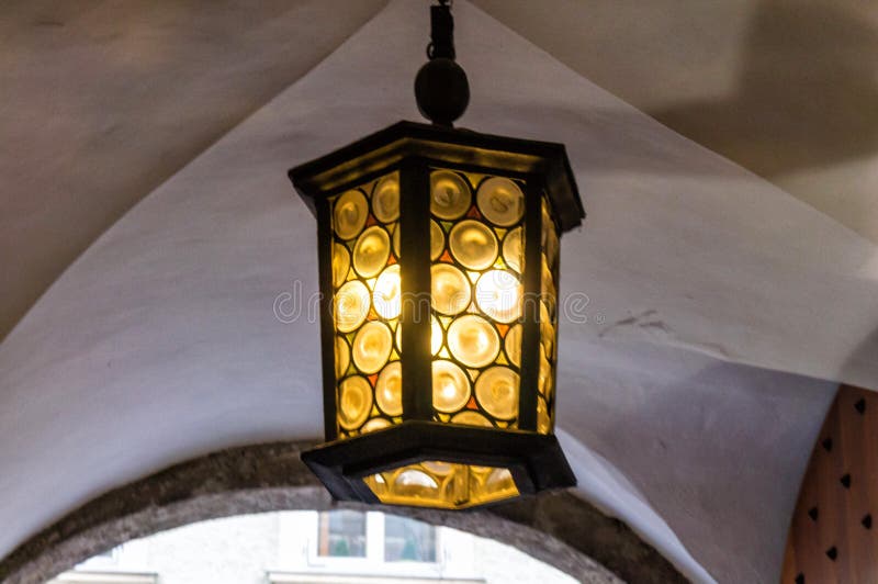 Vintage Luminous Lamp Under Ceiling with Yellow Light Stock Photo ...