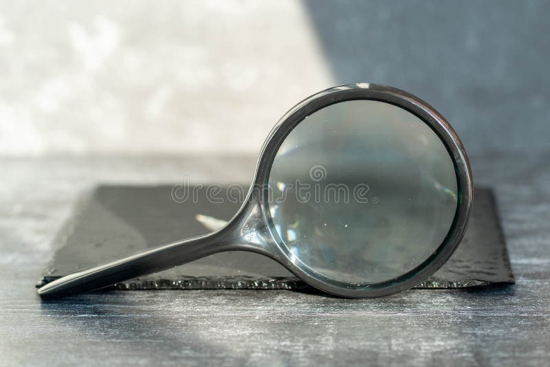 Vintage Magnifier on Dark Background, Side View Stock Photo - Image of ...