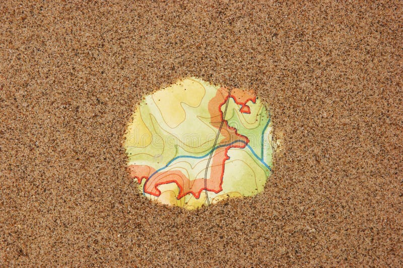 Vintage map in the sand stock photo. Image of sign, longitude - 157122672