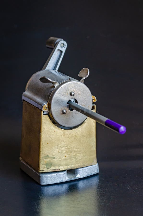 Vintage Mechanical Pencil Sharpener with a Pencil Inside. Front View ...