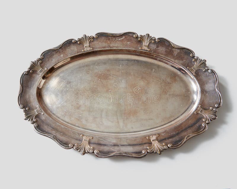 Vintage Metal Oval Shaped Tray with Pattern on a Gray Background with ...