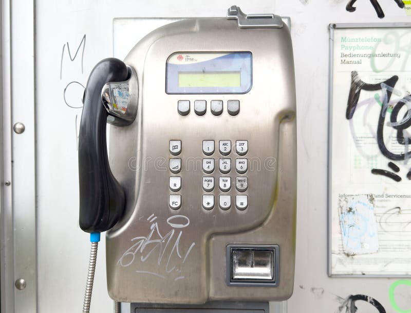 Vintage Metal Payphone with Graffiti in Urban Setting Editorial Image ...
