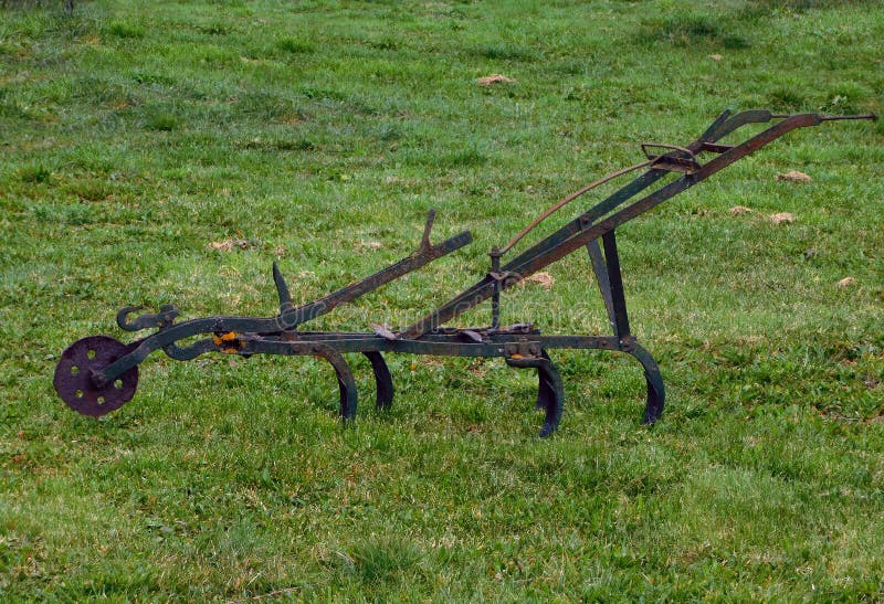 Old Metal Plow Used in Rural Areas with Animals Stock Photo - Image of ...