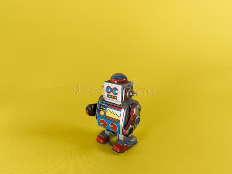 Robot on a Yellow Background Stock Photo - Image of copy, robots: 136201864
