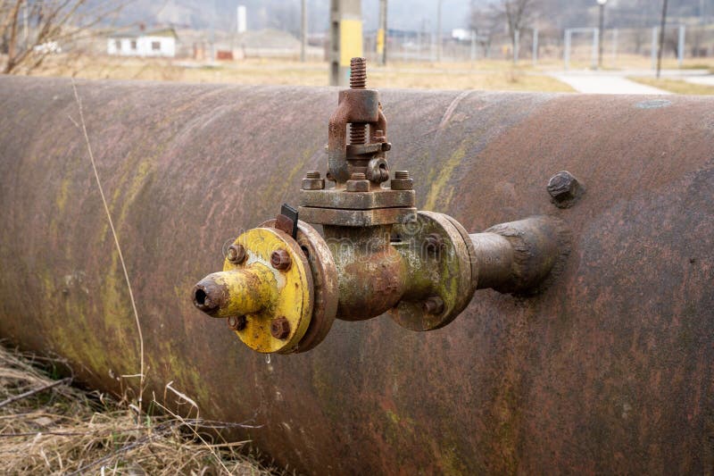 Vintage Meter Attached To a Metal Pipe on the Ground Stock Image ...