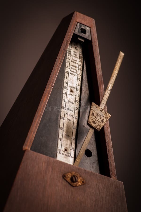 Vintage metronome stock image. Image of instrument, andante - 26093827