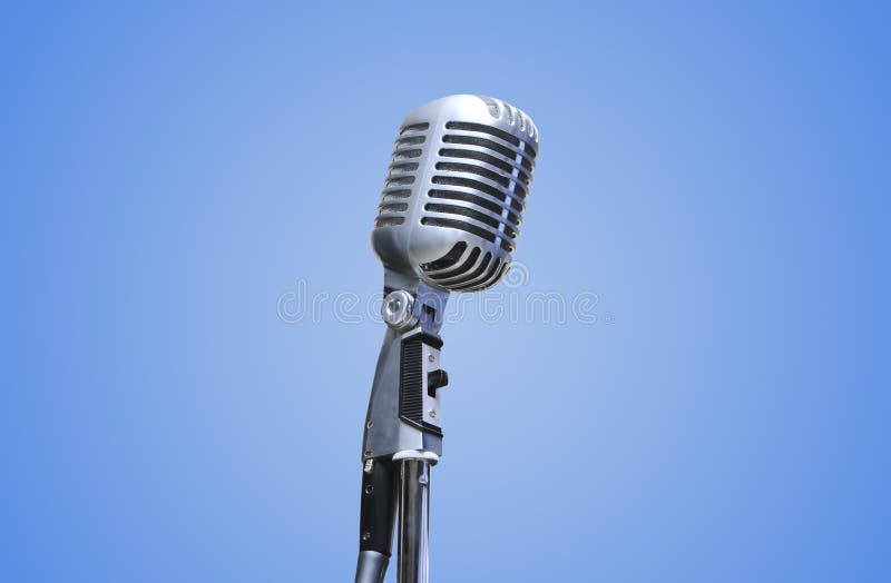 Vintage microphone on blue stock photo. Image of radio - 4641868