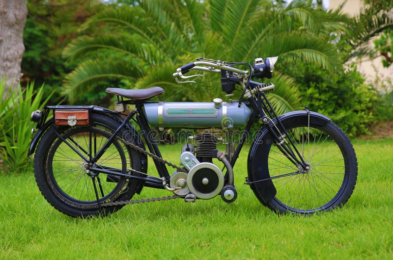 Vintage Motorcycle on Green Grass in the Garden. Vintage Triumph ...