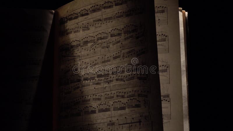 Vintage Music Notes with Ray of Light on Black, Cam Moves Top Down ...