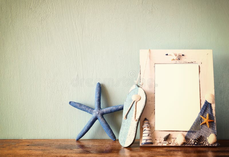 Vintage Nautical Frame with Starfish on Wooden Table. Retro Filtered ...