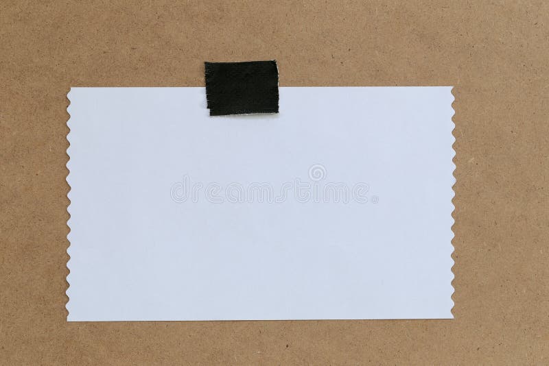 Vintage of Note Paper on Brown Background and Copy Specs. Stock Photo ...
