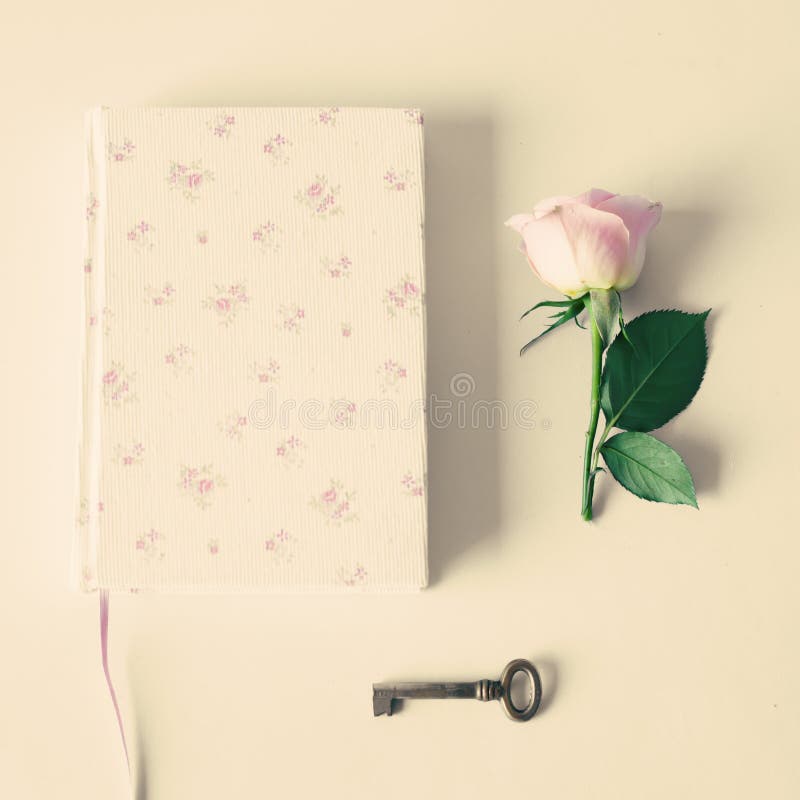 Vintage notebook and rose stock photo. Image of pink - 45985138