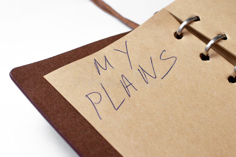Vintage Notebook with Yellow Paper with My Plans Text is on Top of ... Vintage Notebook with Yellow Paper with My Plans Text is on Top of ...