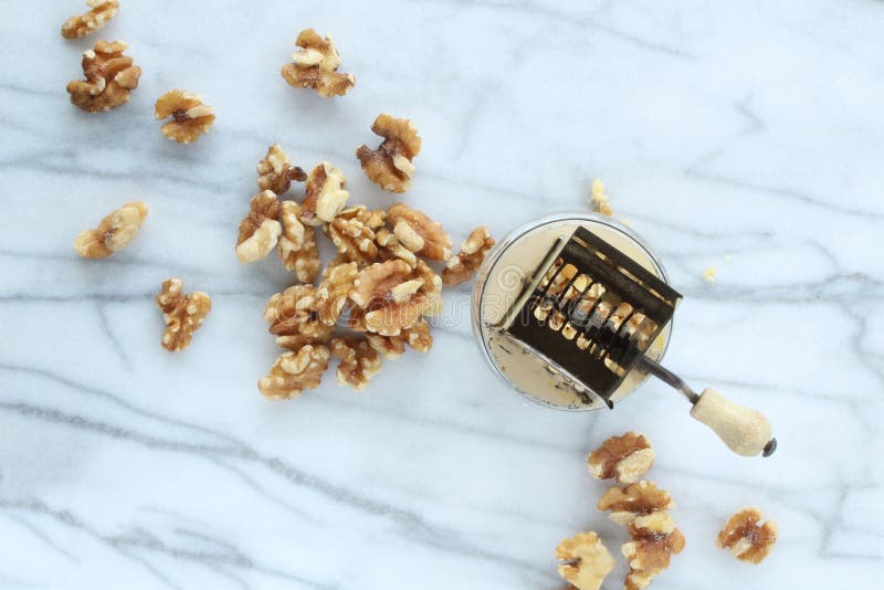 Hand powered nut grinding stock image. Image of hand - 160774713