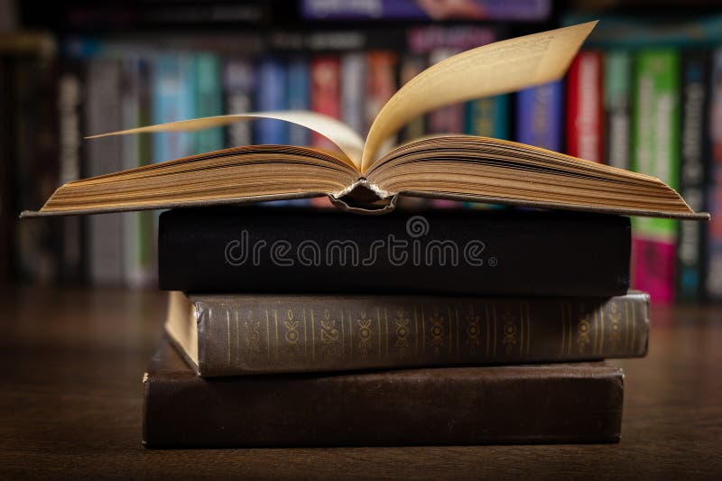 Vintage Old Books on Wooden Deck Table in Library Stock Image - Image ...