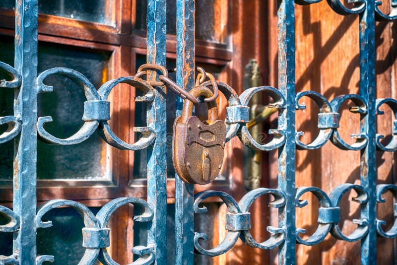 Vintage Padlock Locking an Iron Gate Stock Image - Image of iron ...